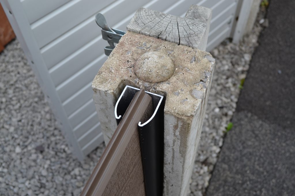 Composite Fencing Reducing Insert for Concrete Posts